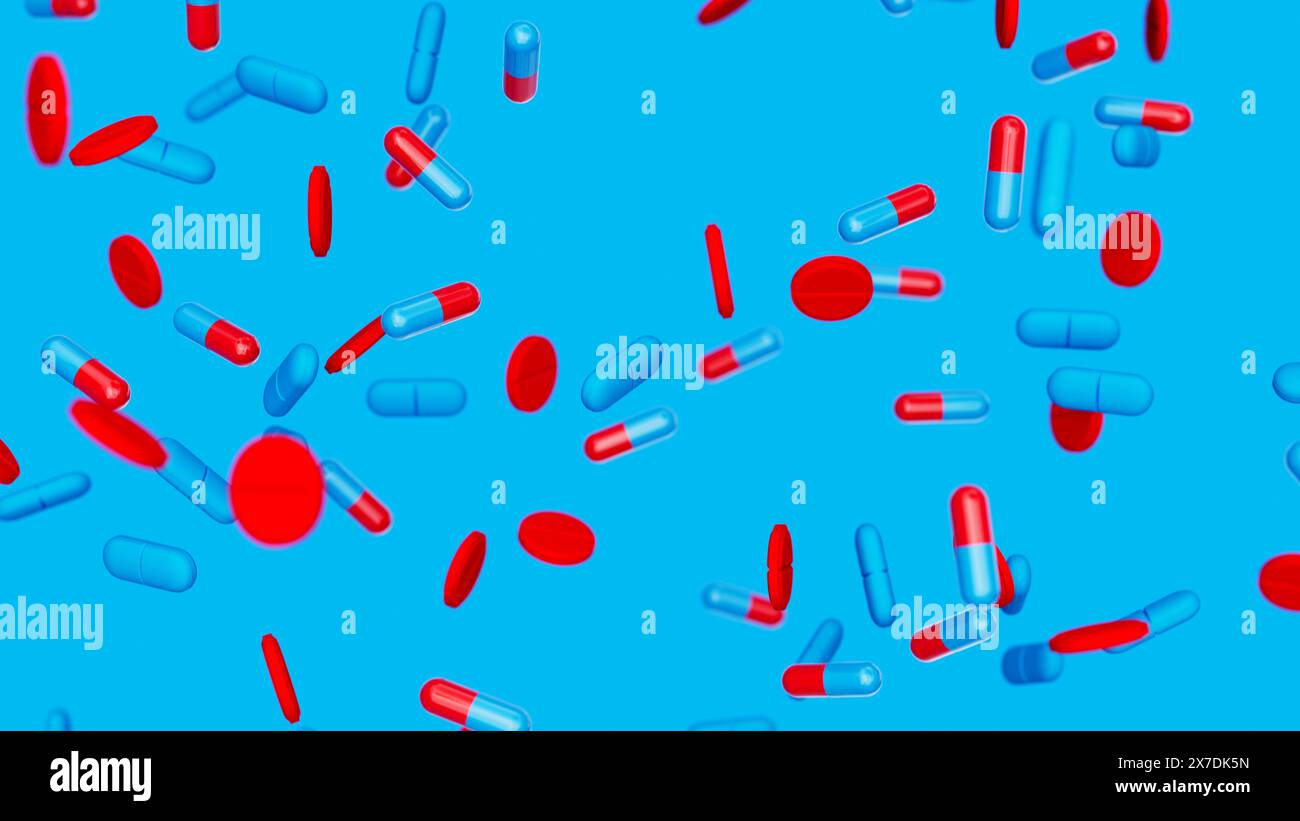 Red blue capsules, tablets and pills against blue backdrop. Drugs ...