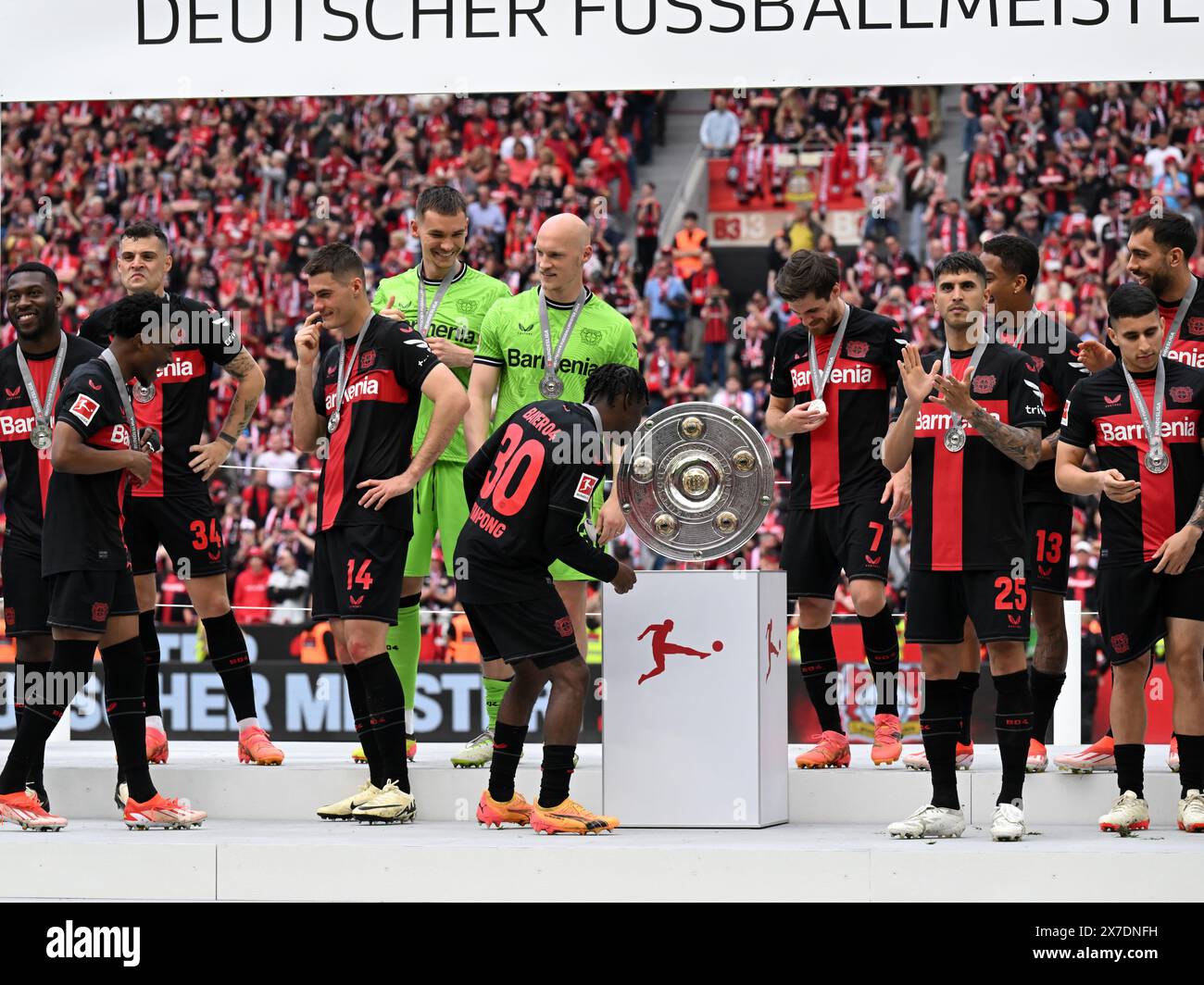 LEVERKUSEN - Jeremie Frimpong of Bayer 04 Leverkusen watches the Bundesliga Meisterschale during ...