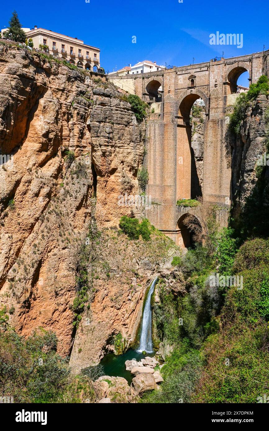 The Puente Nuevo or New Bridge spanning the El Tajo de Ronda canyon and ...