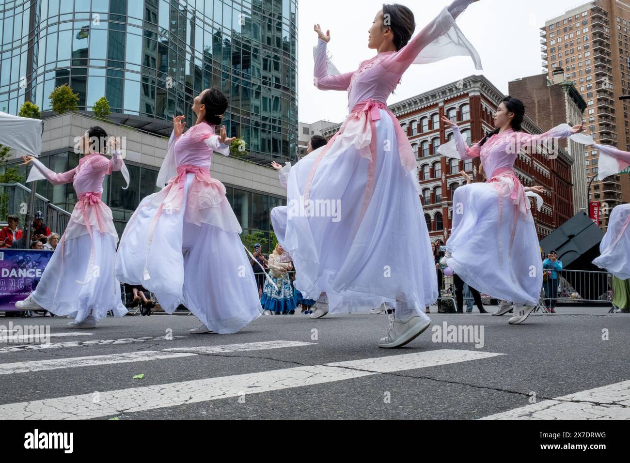 New York, United States. 18th May, 2024. Asian dancers perform in front ...
