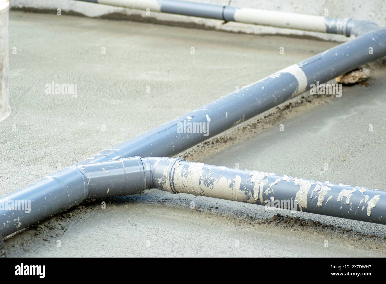 PVC pipes for sewer conducts in the concrete foundation of a house ...