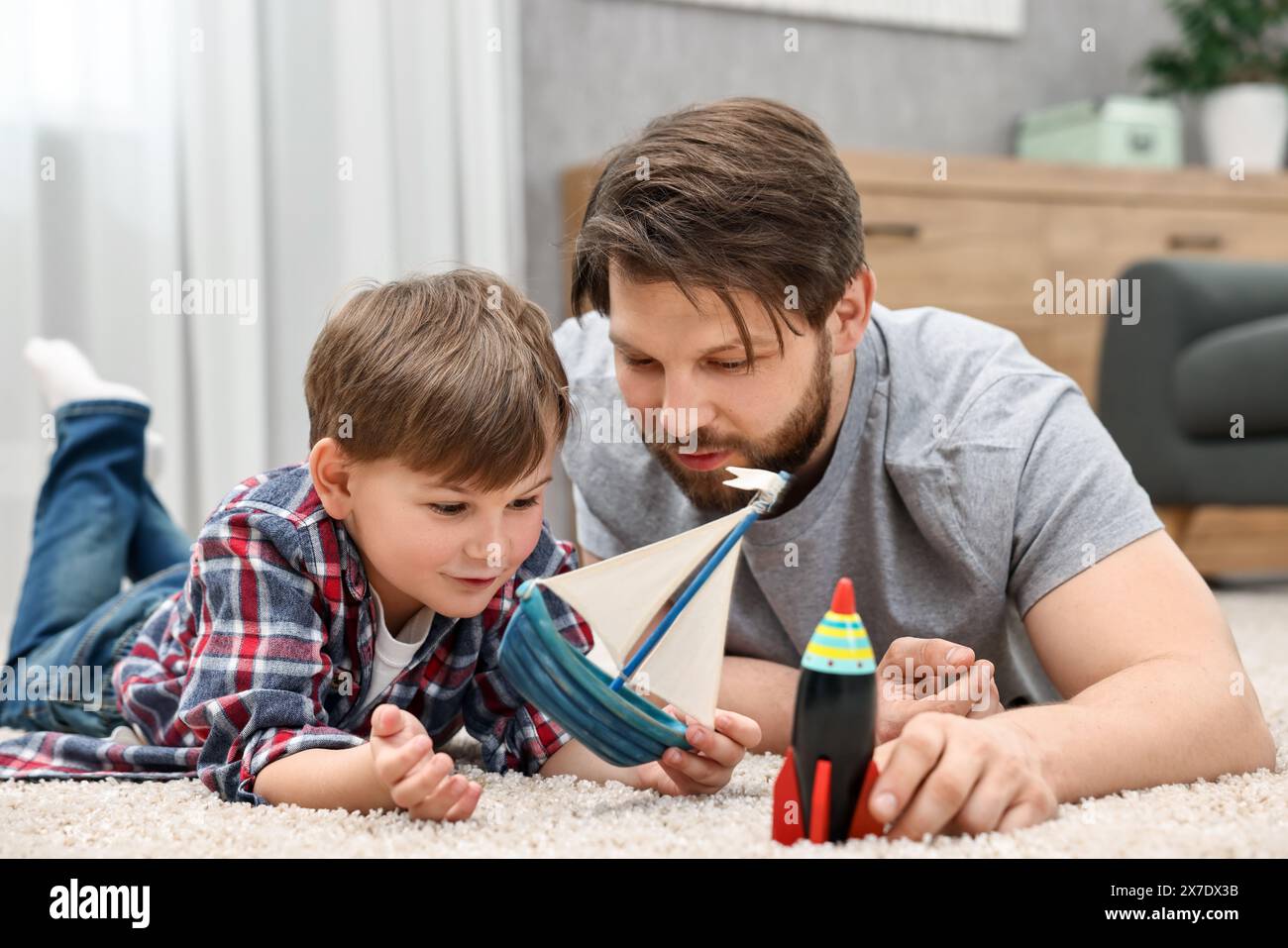 Dad kid playing toys home hi-res stock photography and images - Alamy