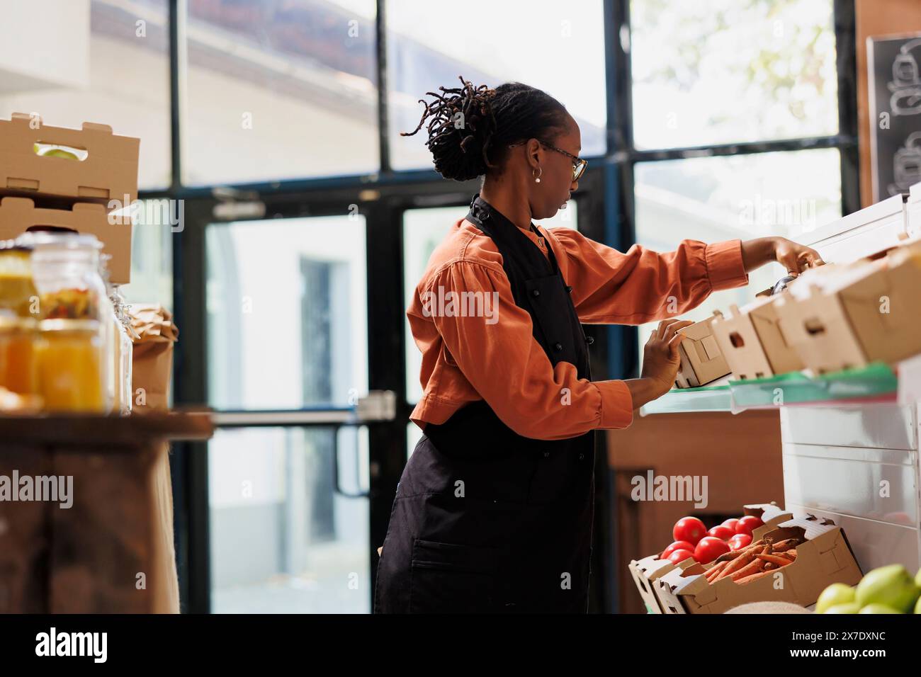 Person organizing fresh fruits hi-res stock photography and images - Alamy