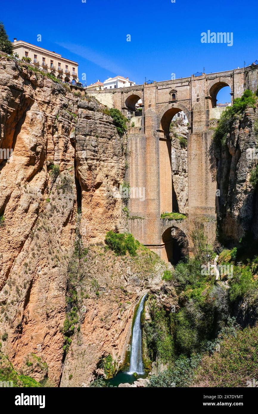 The Puente Nuevo or New Bridge spanning the El Tajo de Ronda canyon and ...