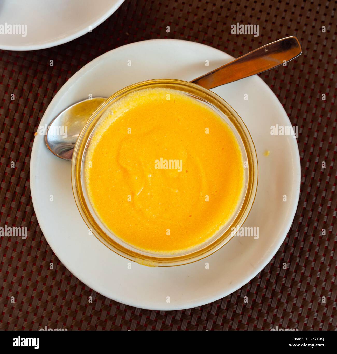 Light mango mousse with airy texture in glass bowl Stock Photo - Alamy