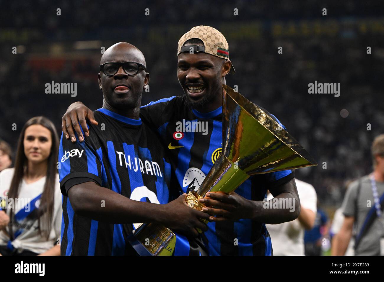 Marcus Thuram of FC Internazionale and Lilian Thuram poses with the Scudetto trophy during Serie ...