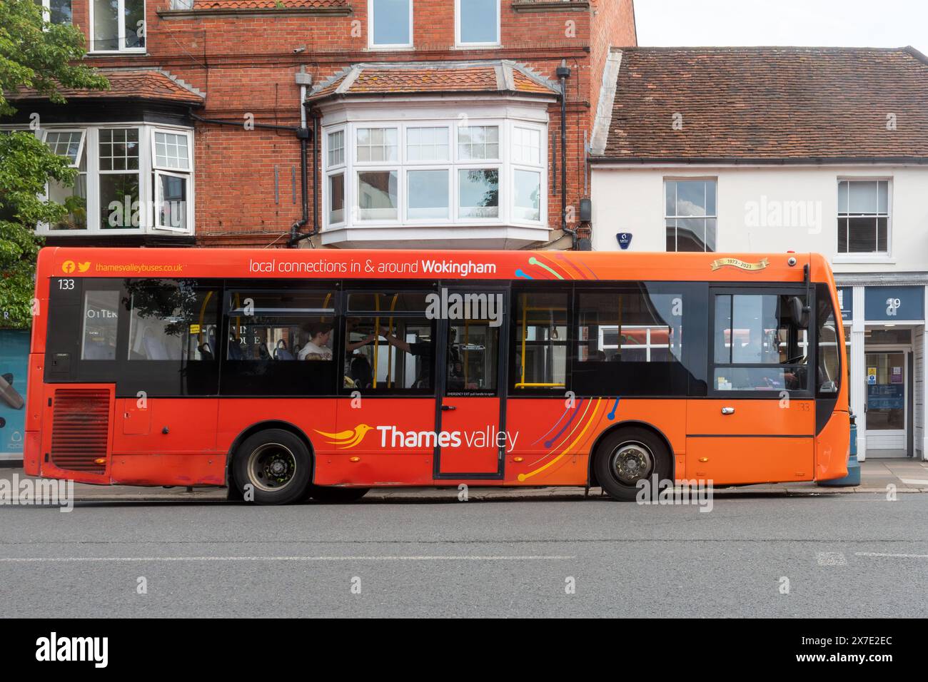 A Thames Valley single decker bus with red and orange livery in Wokingham town, Berkshire ...