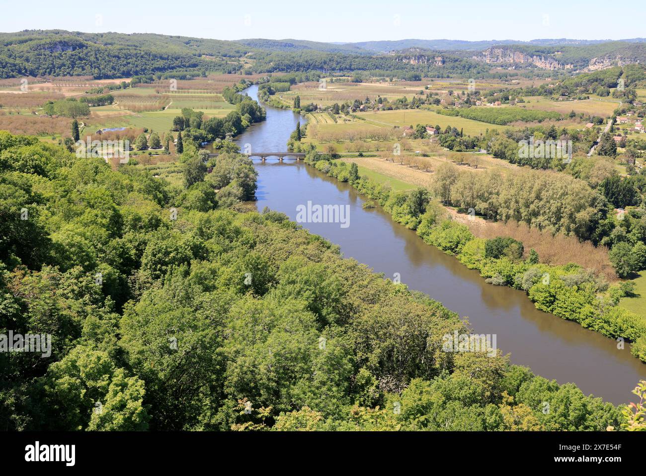The Dordogne River flows through agricultural land in Périgord Noir in ...