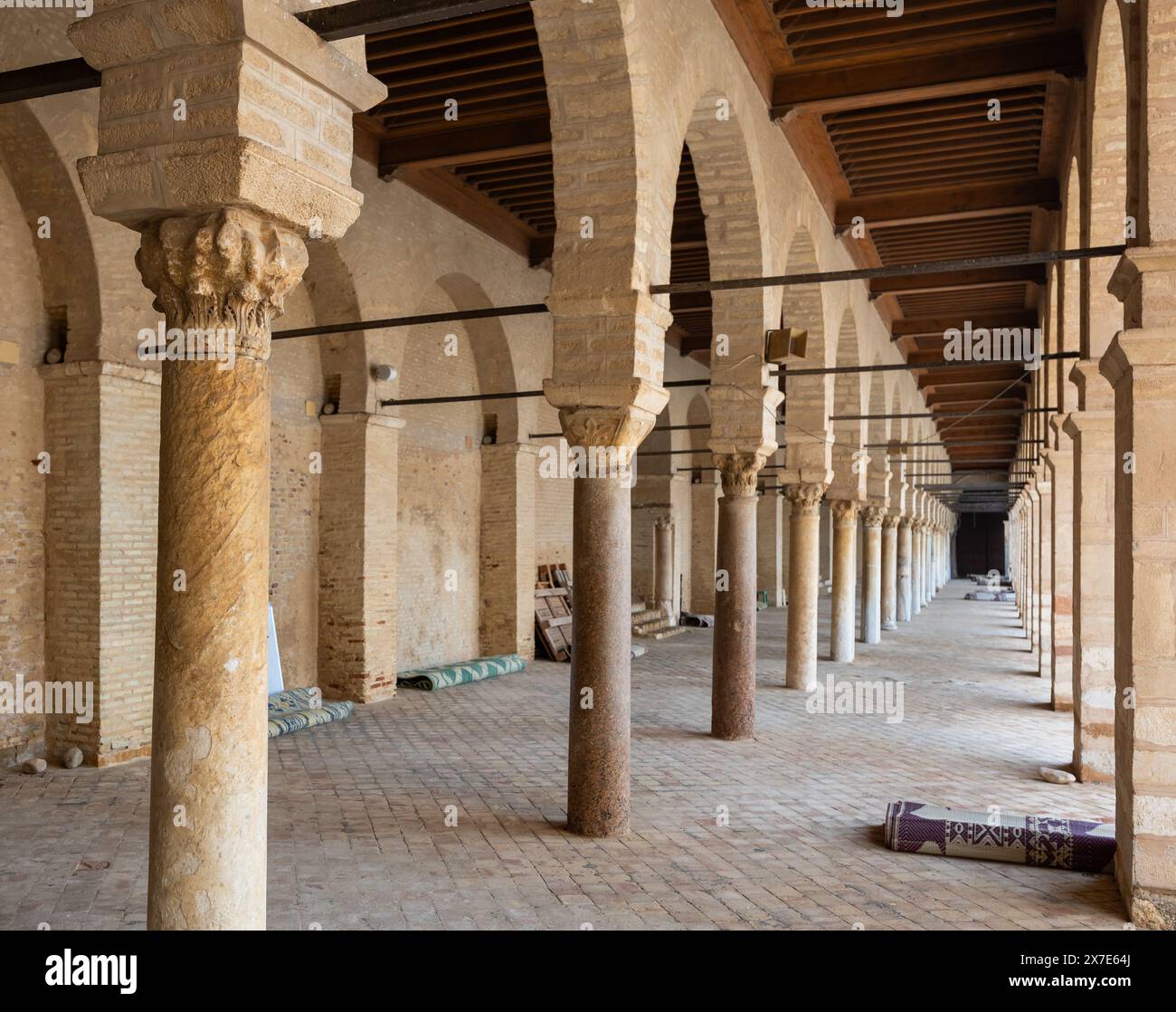 Corridor gallery around inner courtyard of Great Mosque of Kairouan ...