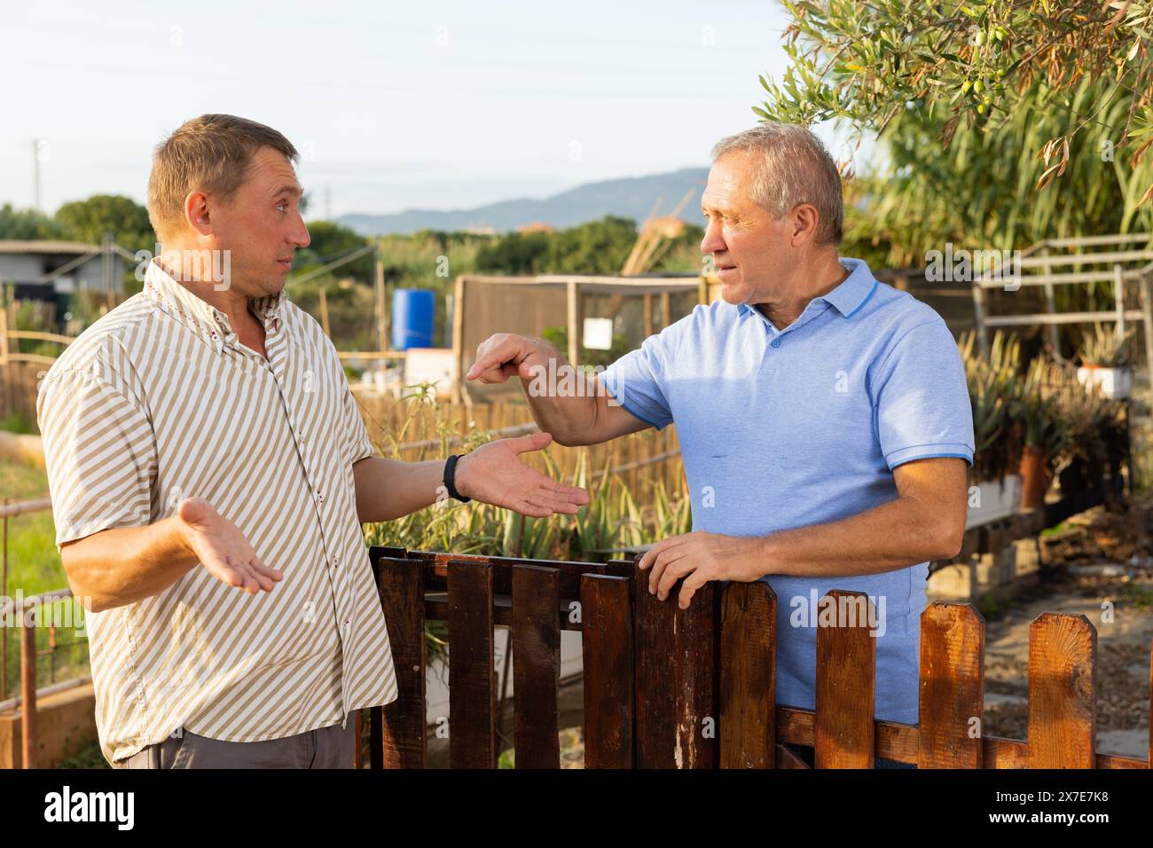Meeting between fence hi-res stock photography and images - Alamy