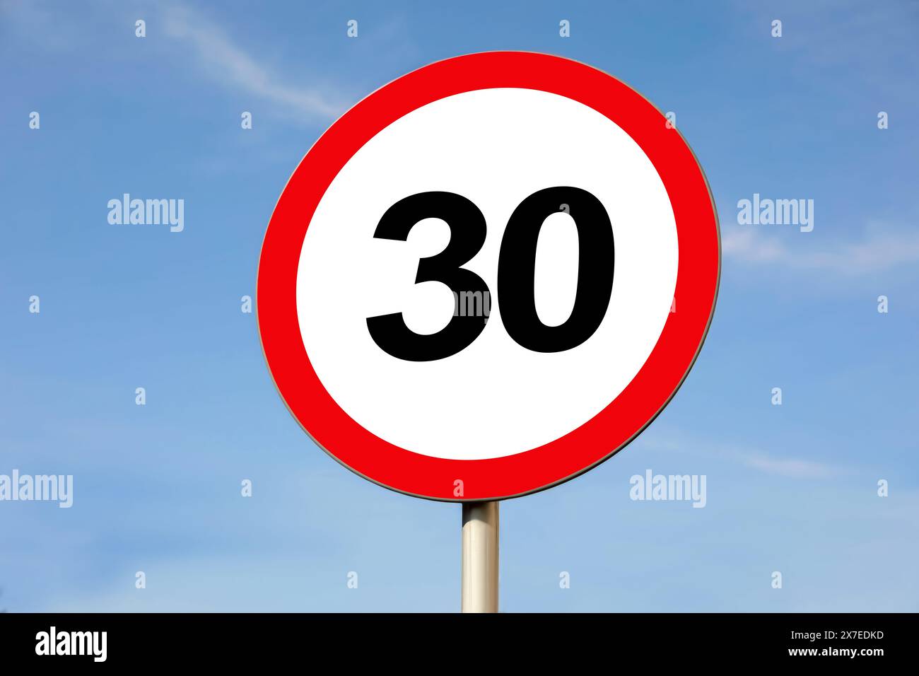 Road sign Maximum speed limit against blue sky Stock Photo - Alamy