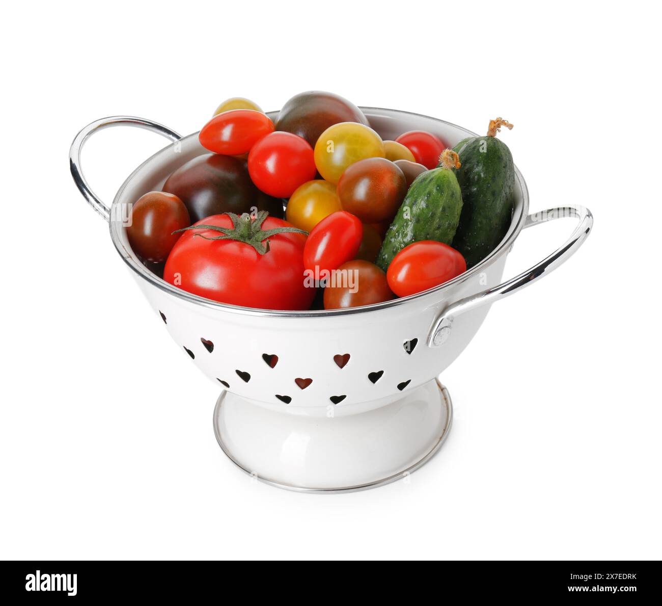 Metal colander with different tomatoes and cucumbers isolated on white ...
