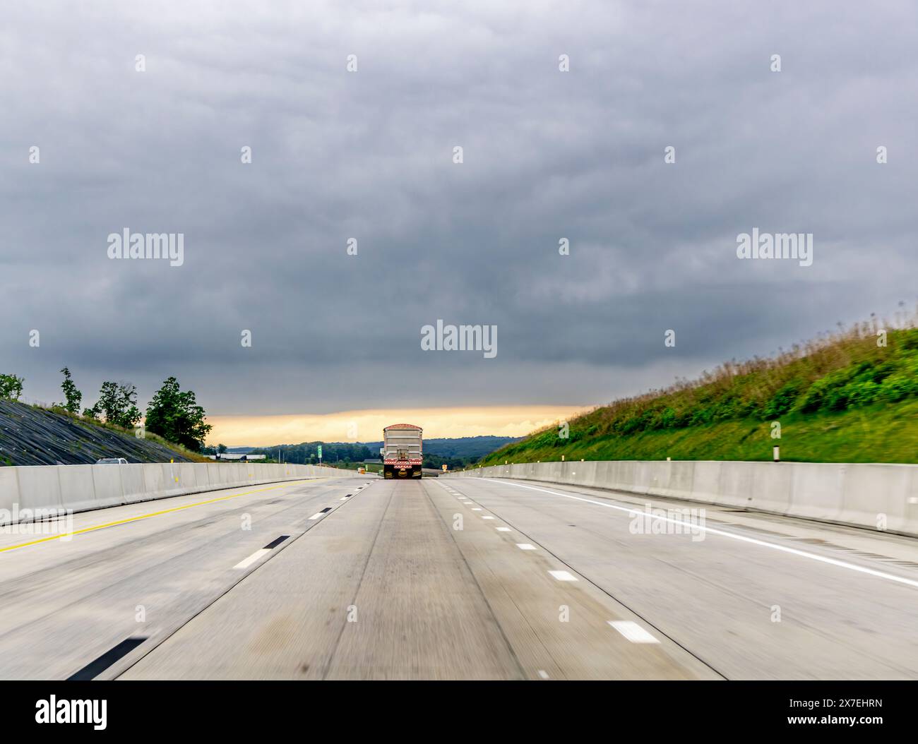 large semi trailer from the rear outlined in red lights Stock Photo - Alamy