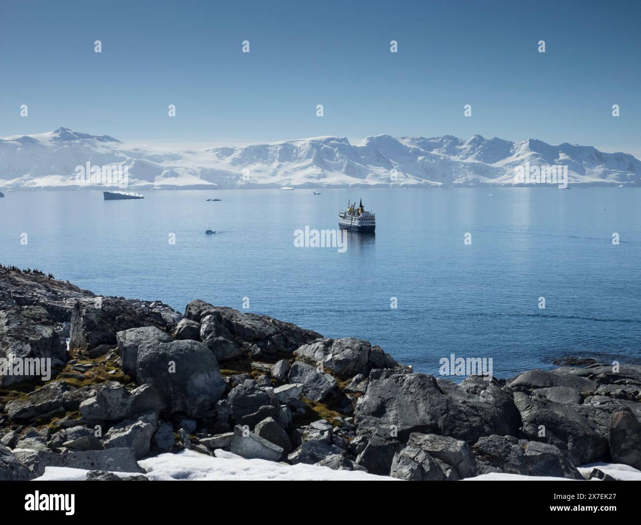 A cruise ship lies anchored off Palaver Point, Two Hummock Island ...