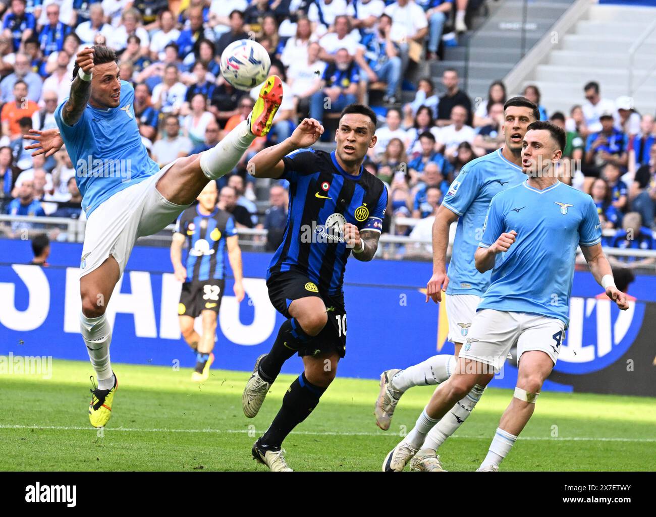 Milan, Italy. 19th May, 2024. Lazio's Luca Pellegrini (L) vies for the ball during a Serie A ...