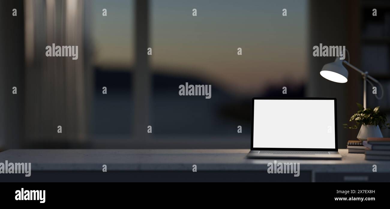 A white-screen laptop computer mockup on a table near the window with a ...