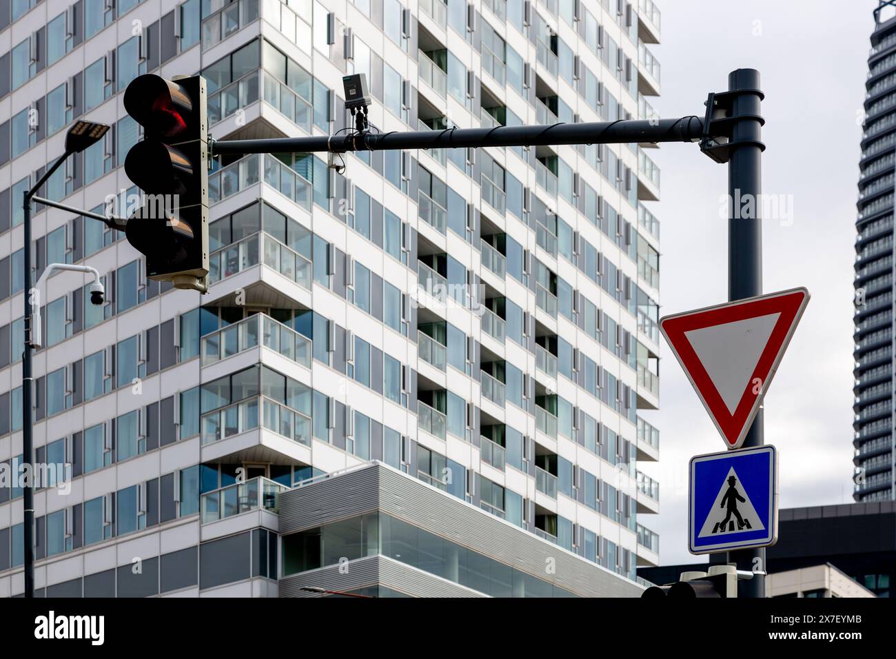 Road signs and traffic lights on the face of the city Stock Photo - Alamy