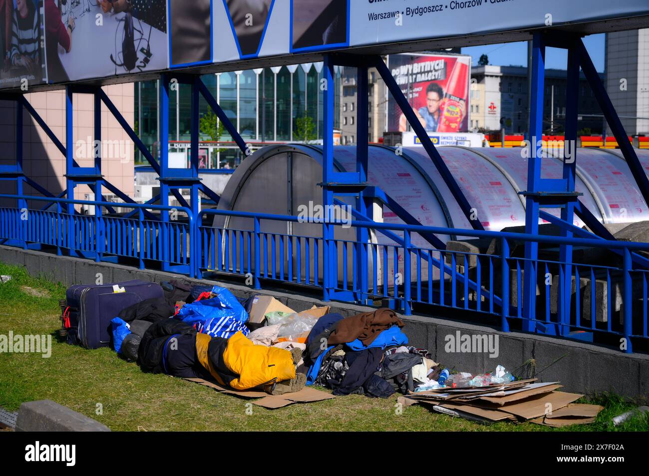 Warsaw, Poland. 17th May, 2024. A homeless man is seen sleeping under ...