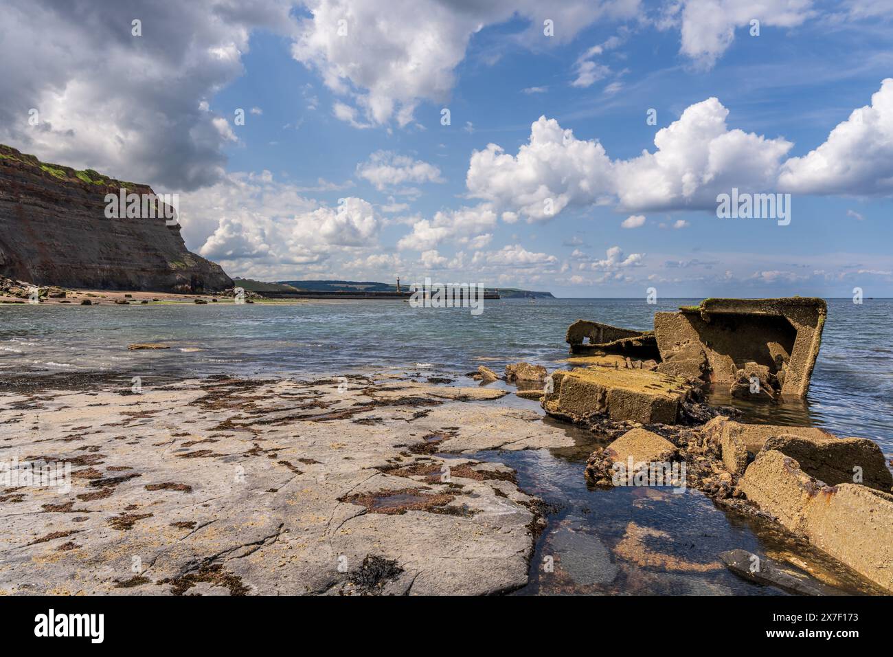 View from the North Sea coast at the East Cliff towards the lighthouses ...