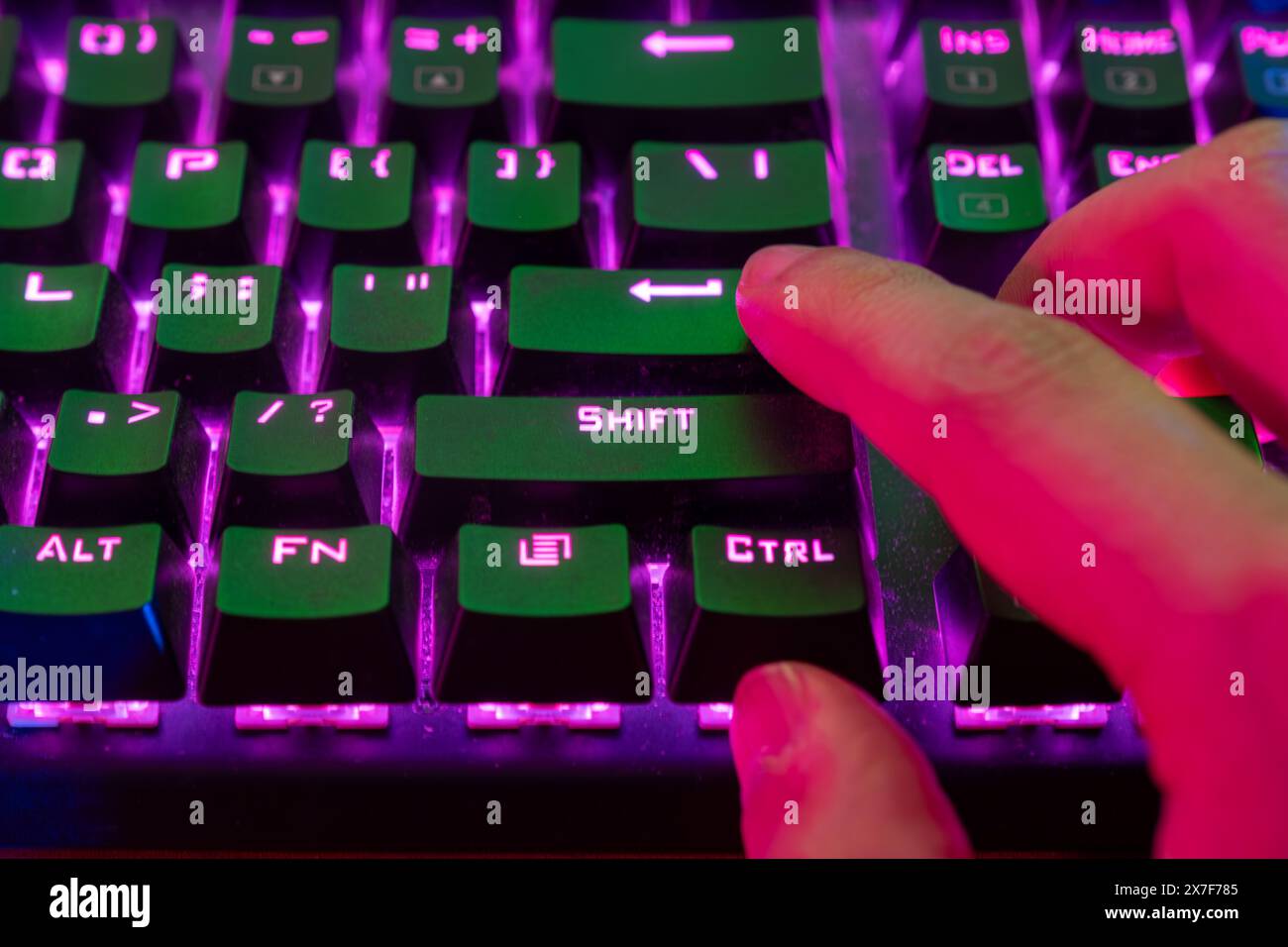 A close up photo for a gamer pressing the Enter key on a mechanical ...