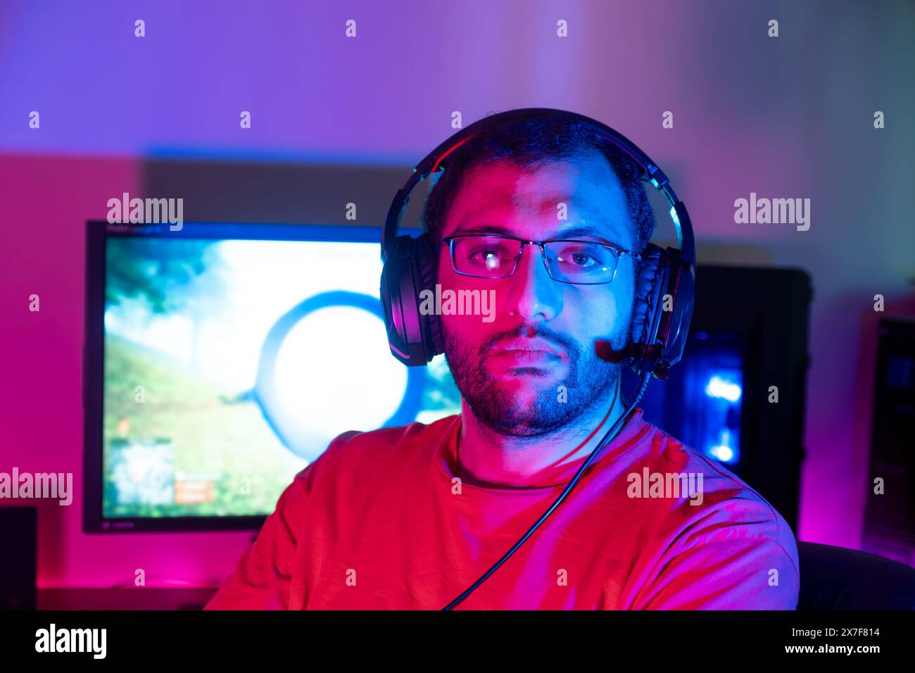 Serious teenage gamer playing hi-res stock photography and images - Alamy