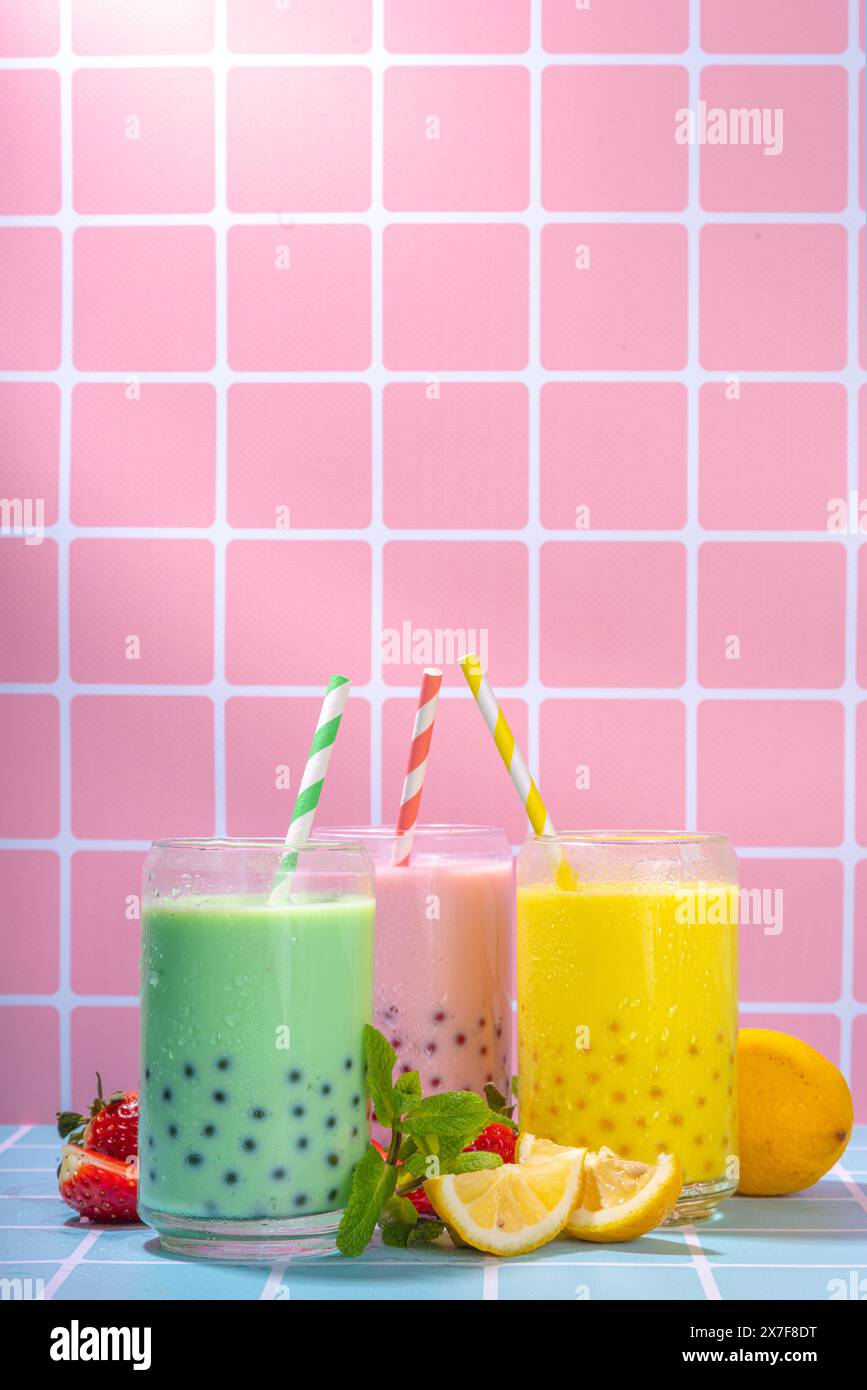 Set of three colorful summer bubble tea, bright creamy pearl tea or ...