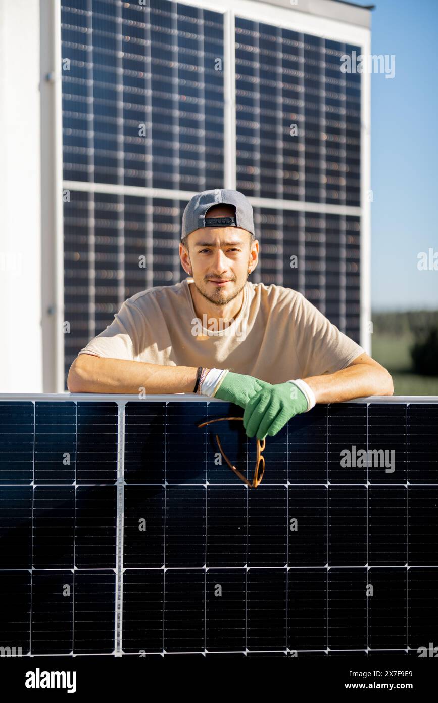 Engineer holding solar panels house hi-res stock photography and images ...
