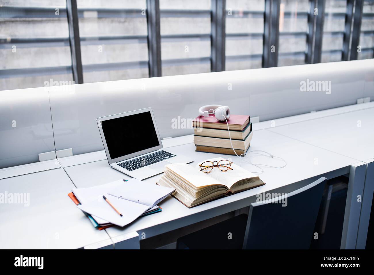 Creating effective study space. Laptop, textbooks, notes and music for ...