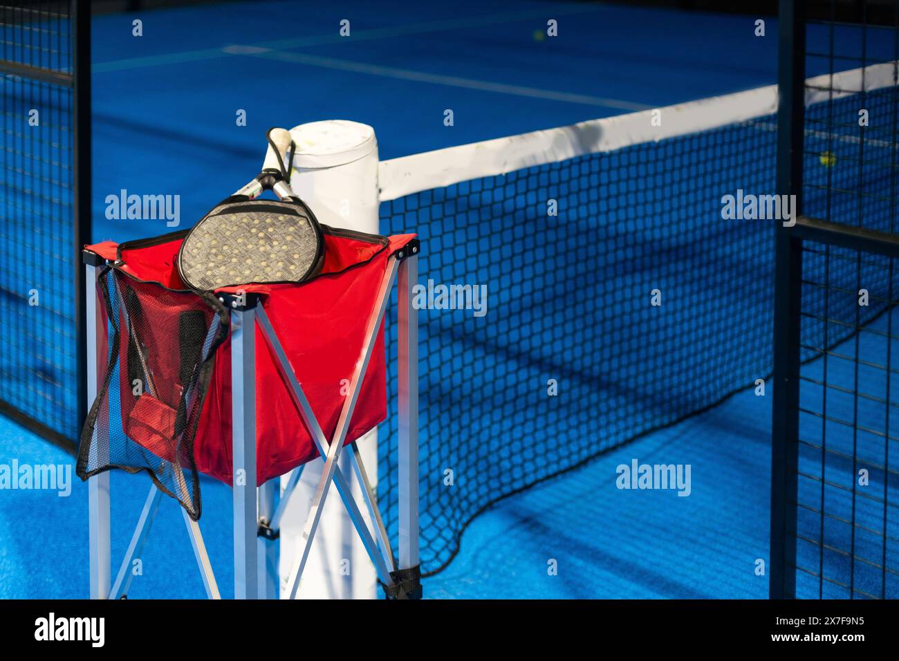 Paddle ball on racket. Yellow paddle ball laying near racket Stock ...