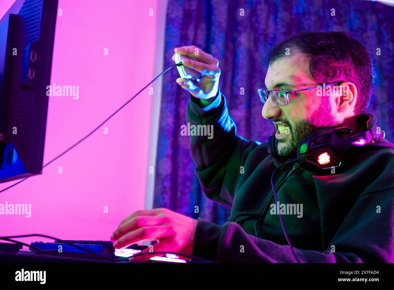 Streamer Angry computer gamer man yells and breaks keyboard after being ...