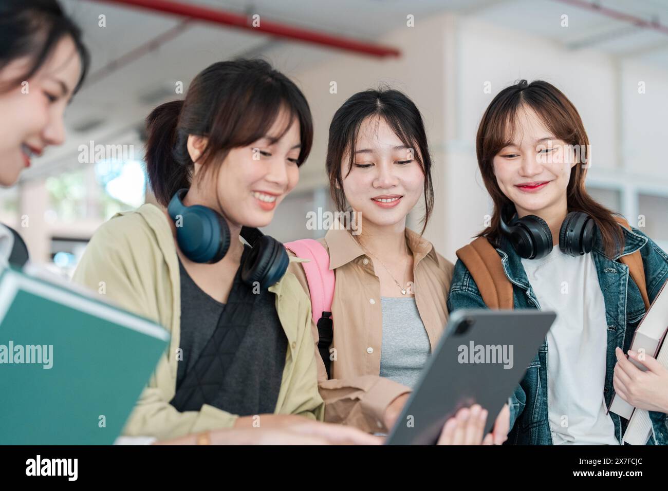 students enjoying working together, collaborating on project. asian ...