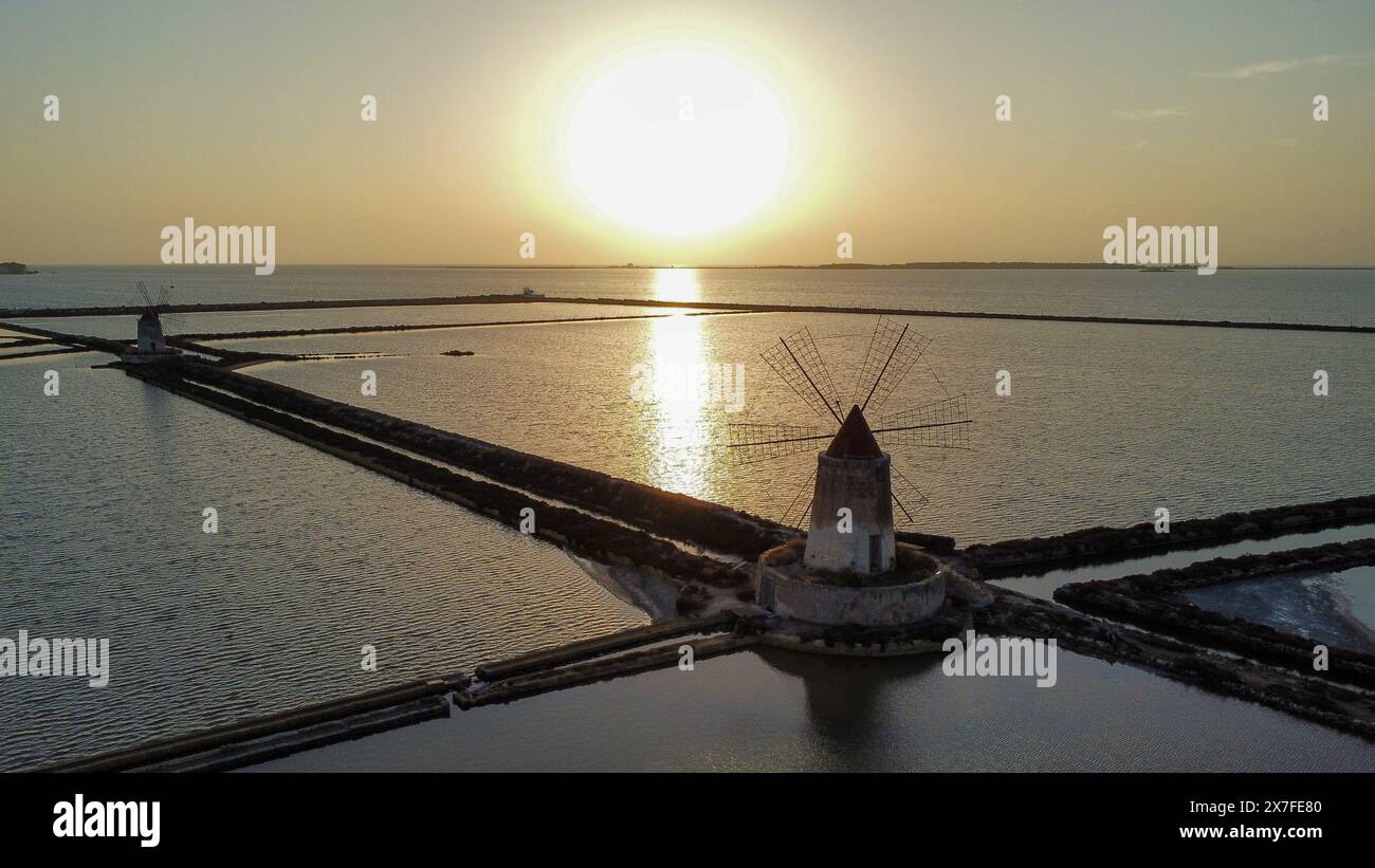 aerial view of the Stagnone salt pans and the ancient windmills at ...