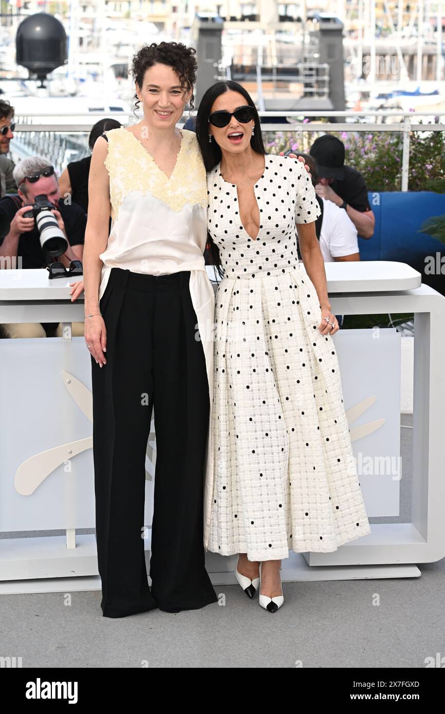 Director Coralie Fargeat (left) and Demi Moore at the photocall for ...