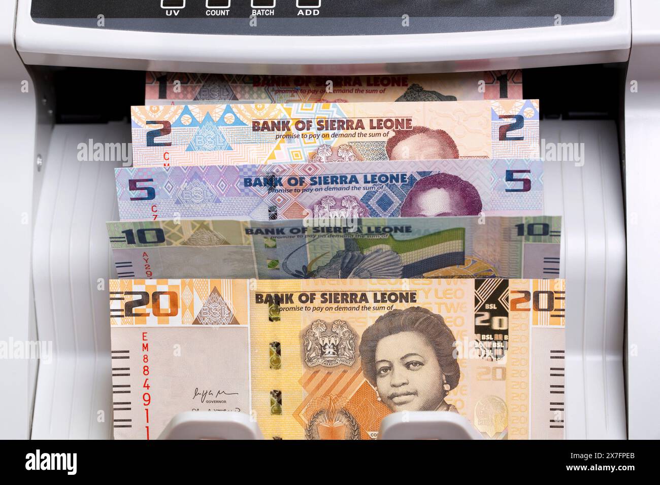 Sierra Leonean money - leone in a counting machine Stock Photo - Alamy