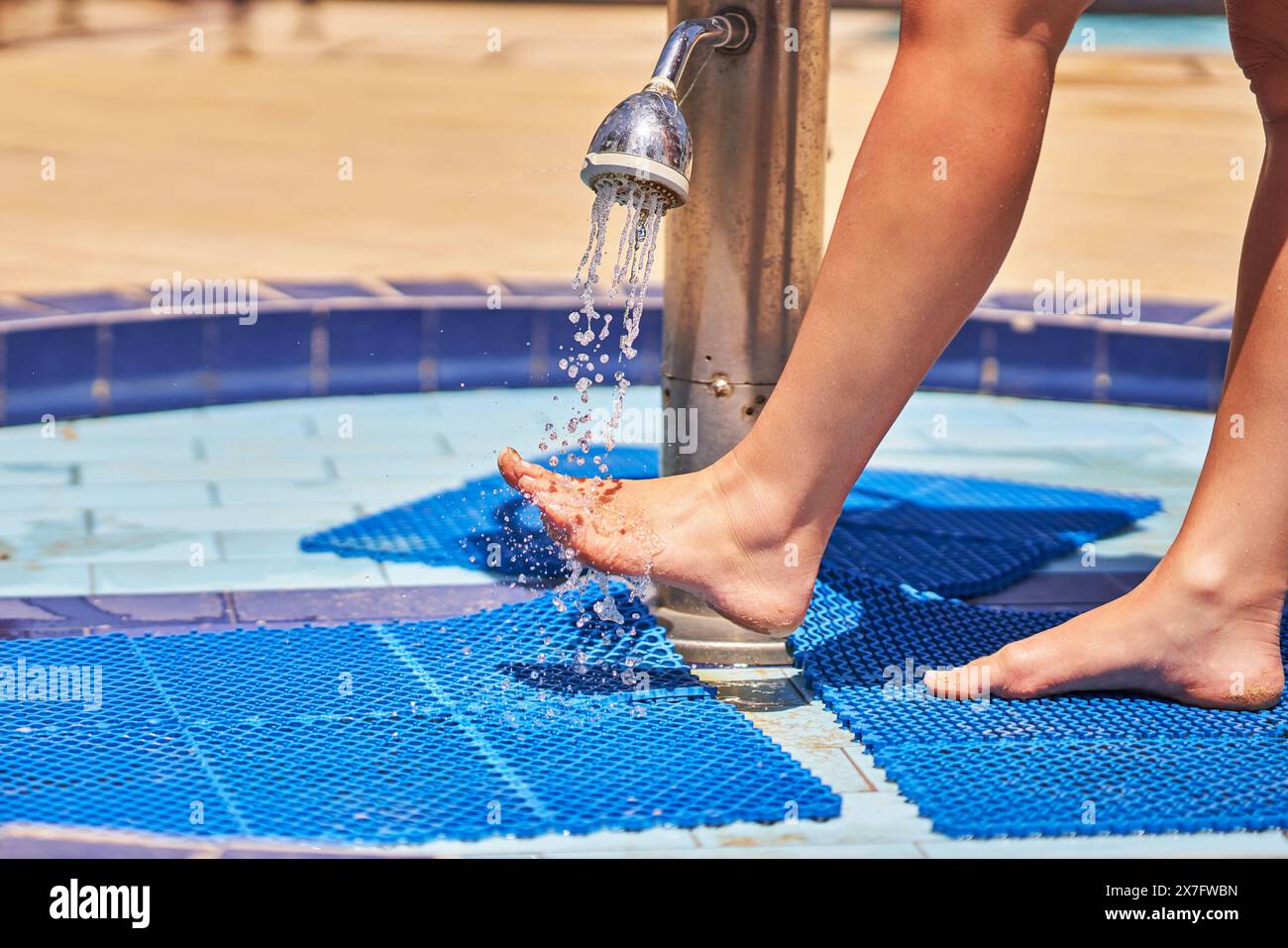 Picture of washing legs before pool entrance Stock Photo - Alamy