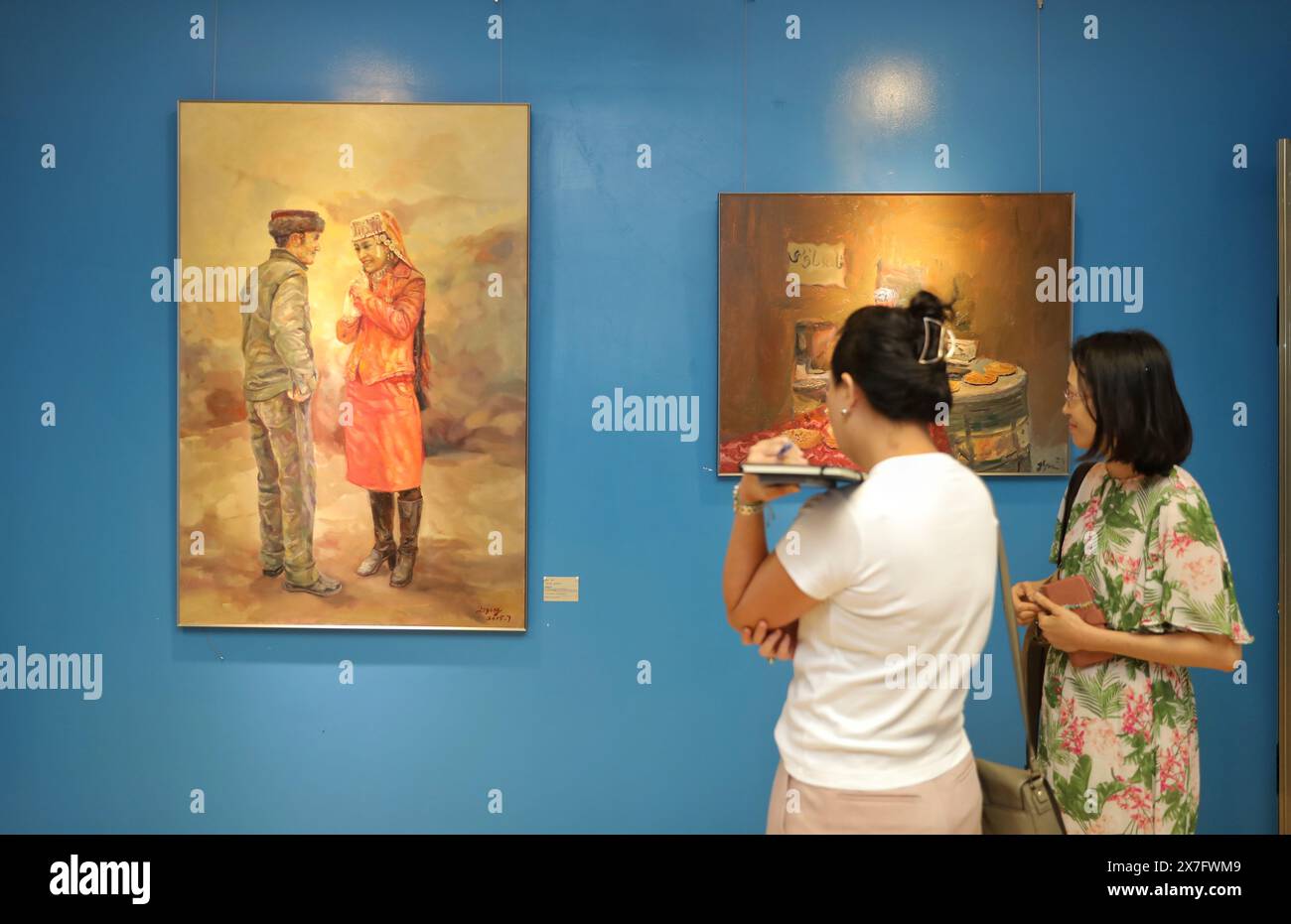 Suva, Fiji. 20th May, 2024. Visitors view an exhibition of Chinese oil ...