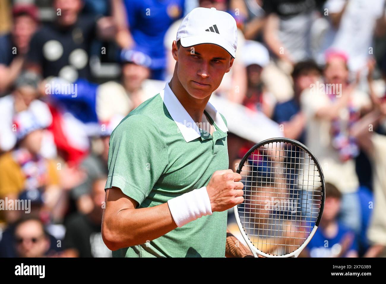 Gabriel DEBRU of France celebrates his point during first qualifying ...