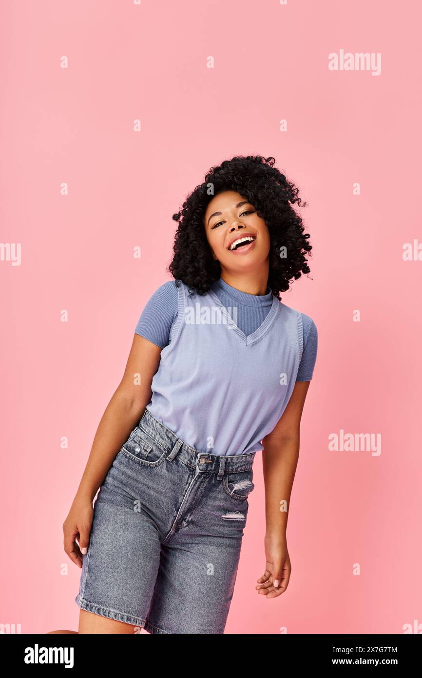 Woman in a blue shirt hi-res stock photography and images - Alamy