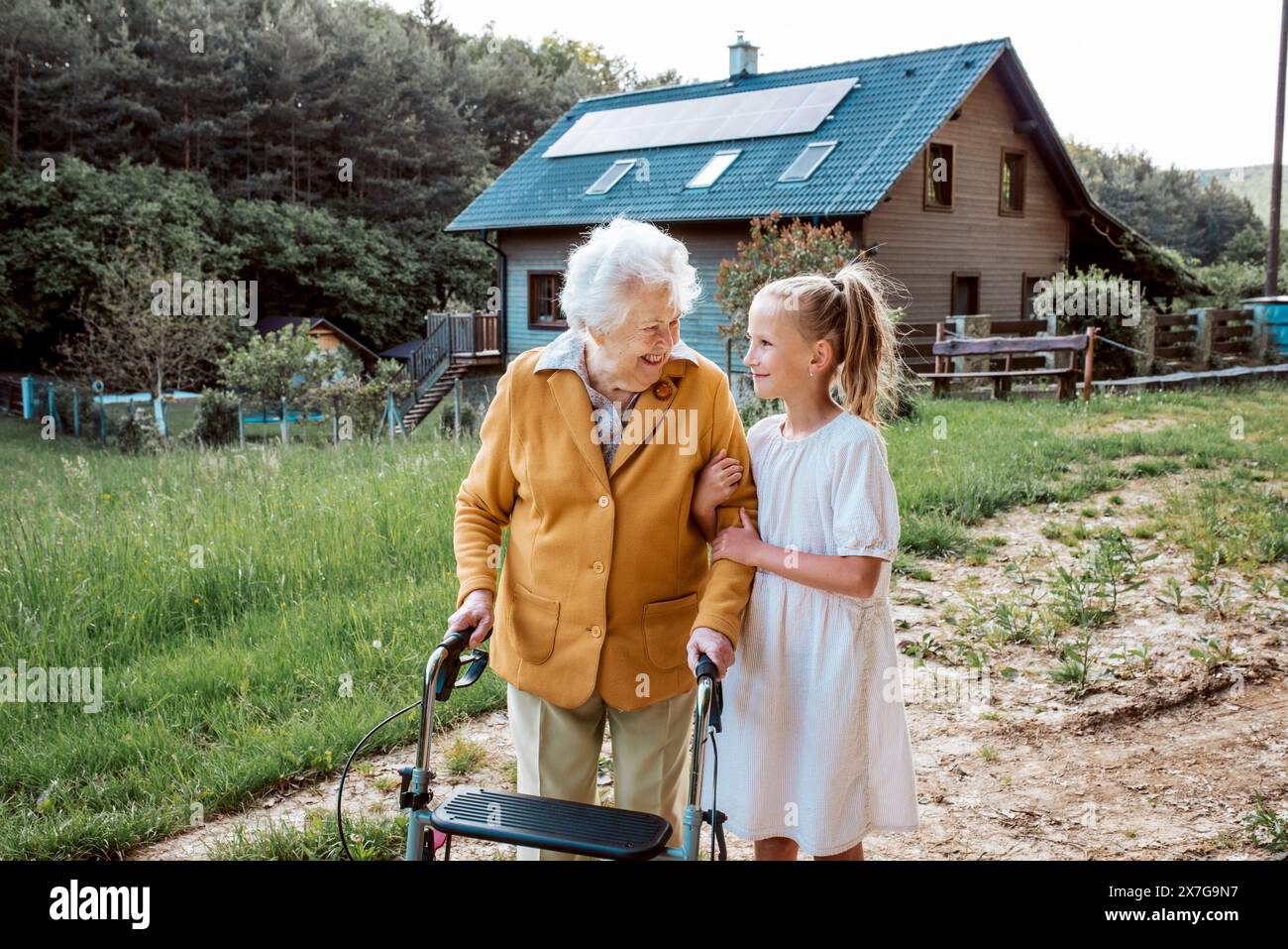 Granddaughter spending time with elderly grandma, companionship. Senior ...