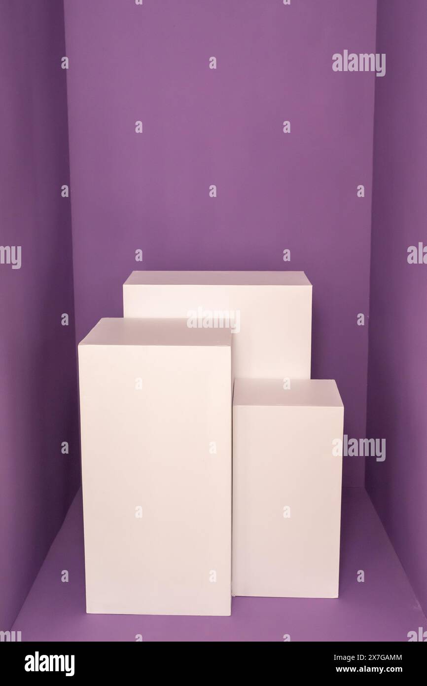 Three white rectangular boxes against purple background. Product ...