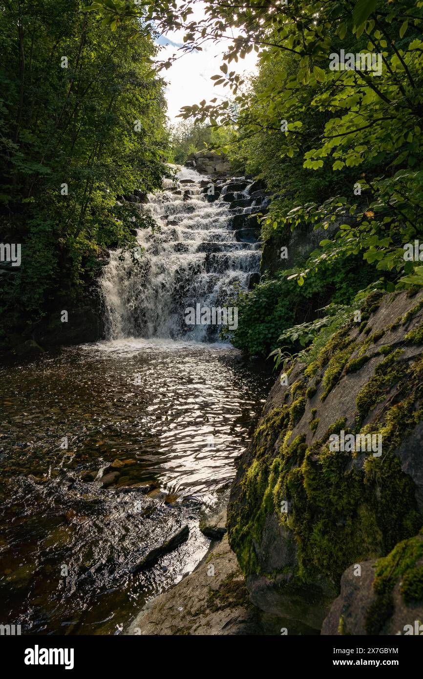 Woodland waterfall on the Ilabekken river by the city of Trondheim ...