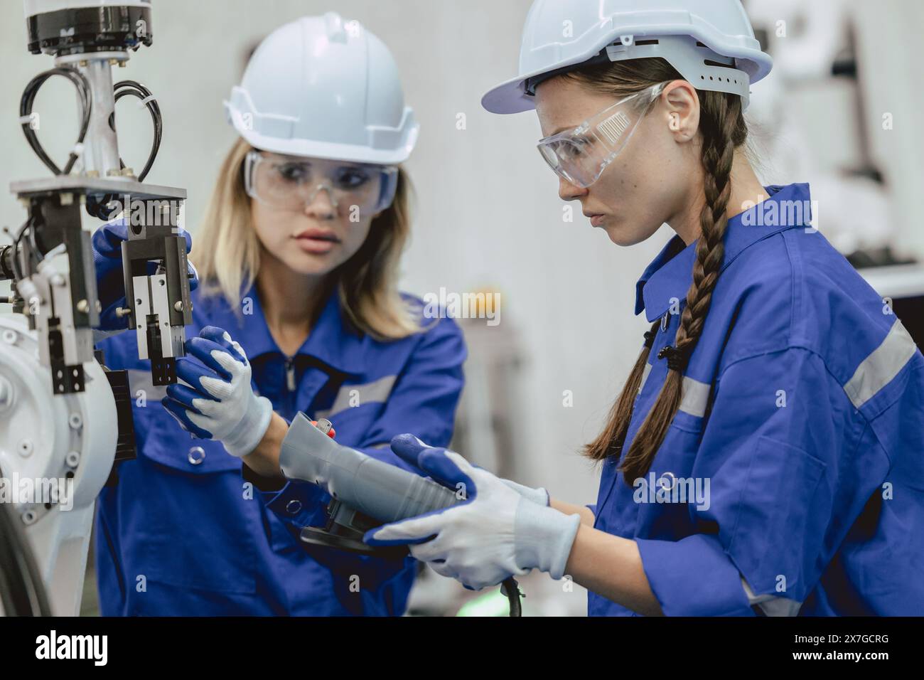 Engineer women university student learn to manual hand control operate ...