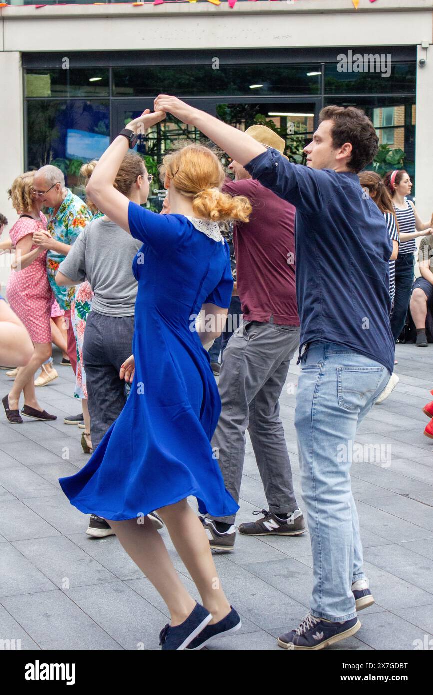 Swing dancers in the street Stock Photo - Alamy
