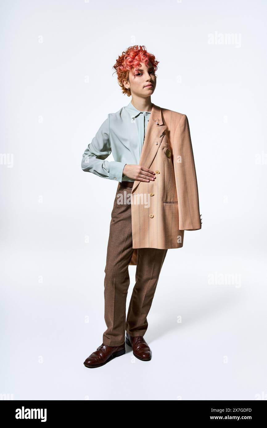 Extraordinary woman with red hair wearing a suit and jacket Stock Photo ...