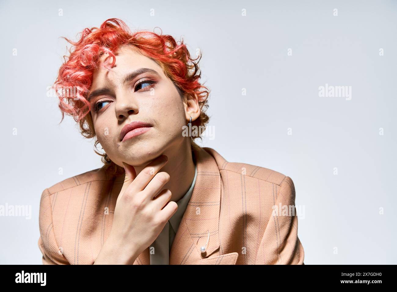 Extraordinary woman with red hair is dressed in a suit and tie Stock ...