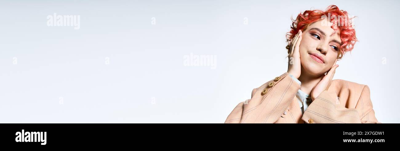 Extraordinary woman with red hair strikes a pose for a portrait Stock ...