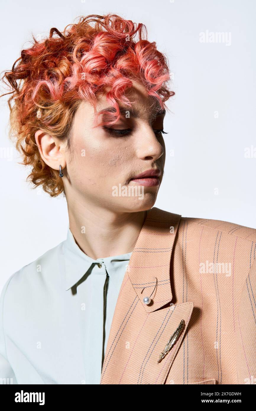 A stunning woman with red hair exudes elegance in a stylish suit Stock ...