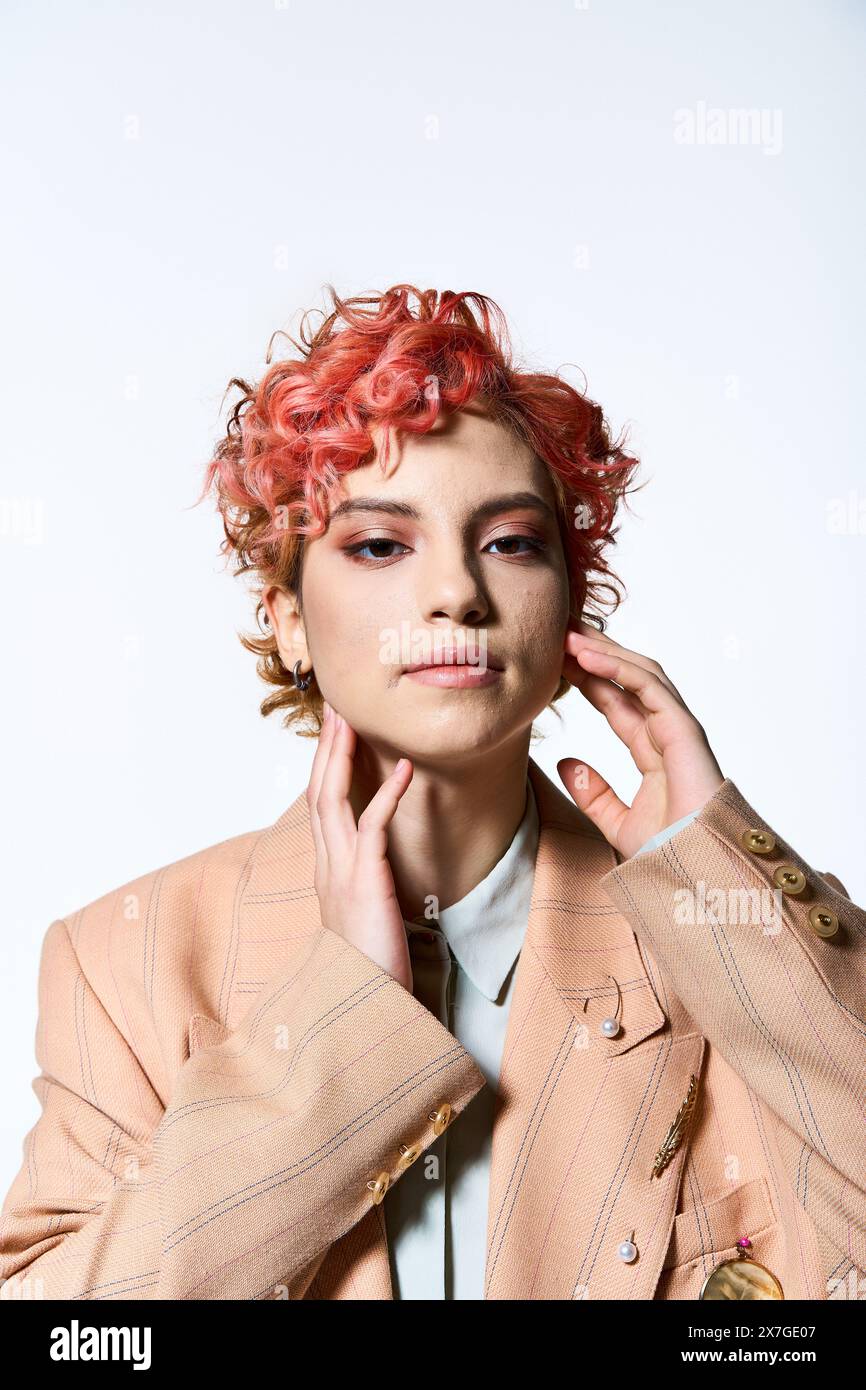 A captivating woman with fiery red hair posing for a picture Stock ...