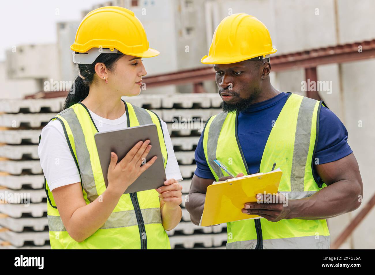 Engineer smart women working contact with African black worker in ...