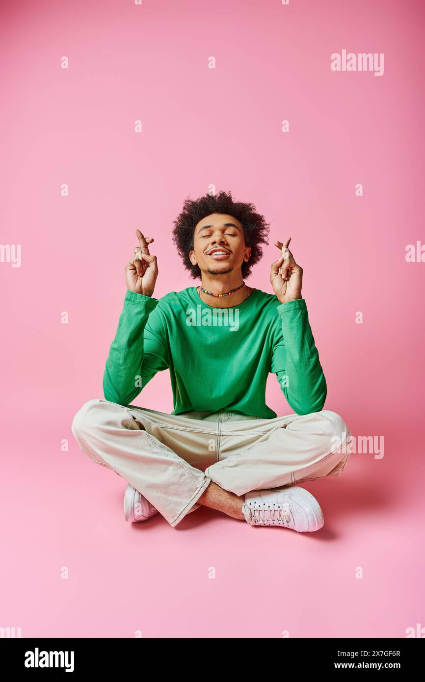 Young man strikes yoga hi-res stock photography and images - Alamy